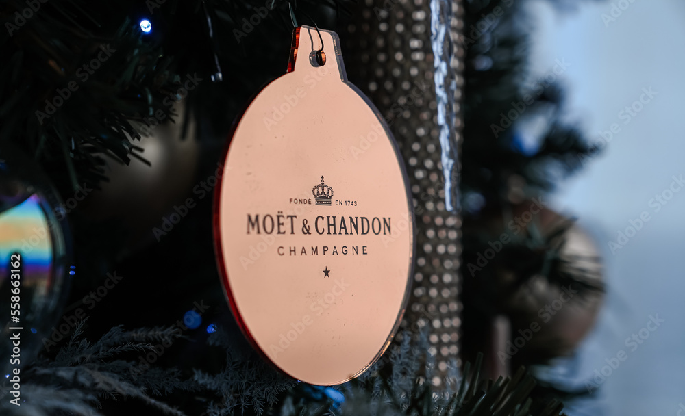 The logo sign of Moet Chandon luxury champagne drink company part of a ...