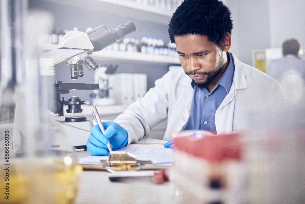 Black man writing report for science experiment, scientist in lab for ...