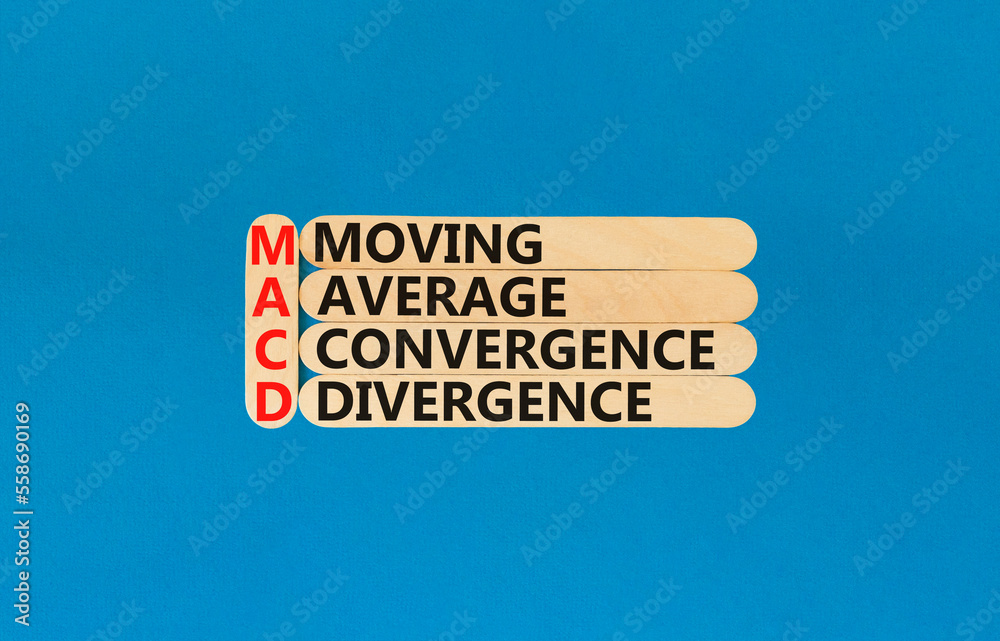 MACD symbol. Concept words MACD moving average convergence divergence on wooden stick on ...