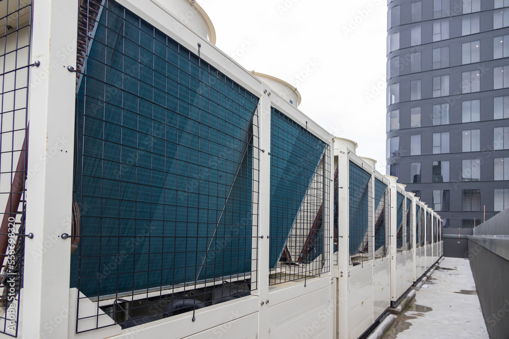 Air conditioner compressor installed on roof building. Industrial air ...