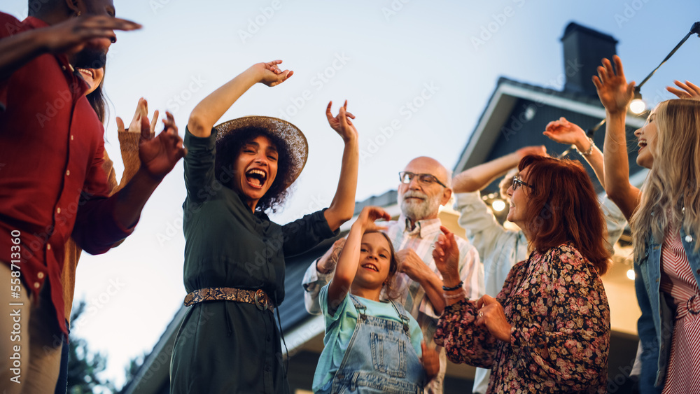 Diverse Multicultural Friends and Family Dancing Together at an ...