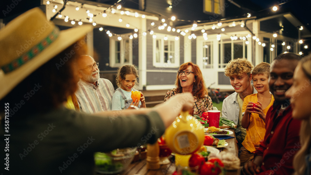 Family and Multicultural Friends Celebrating Outside at Home in the ...