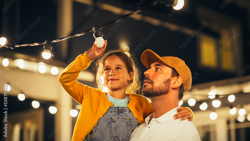 Happy Handsome Father Helping His Little Beautiful Daughter to Change a ...