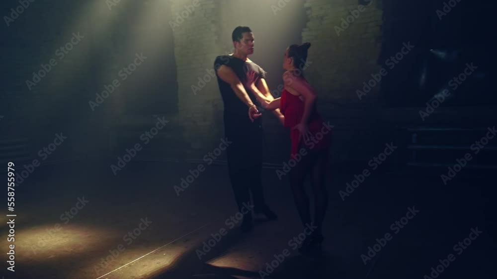 Side view ballroom dancers dancing passionate tango face to face, approaching each other,man ...