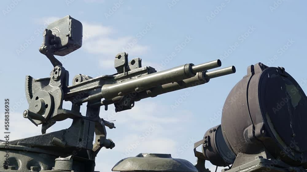 Machine gun on the turret of an armored personnel carrier. Heavy ...