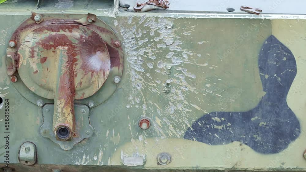 Hole or hole, armor deformation from a projectile close-up. Damaged ...