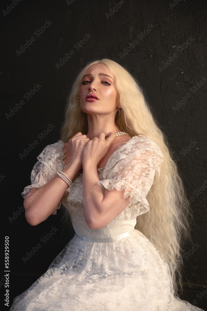 Young girl with white hair in a white vintage dress from the 19th ...