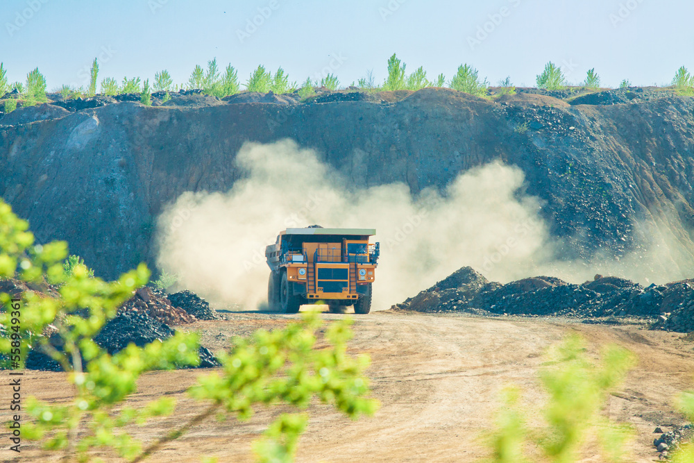 Large quarry dump truck to remove the rock mass from the quarry for the ...