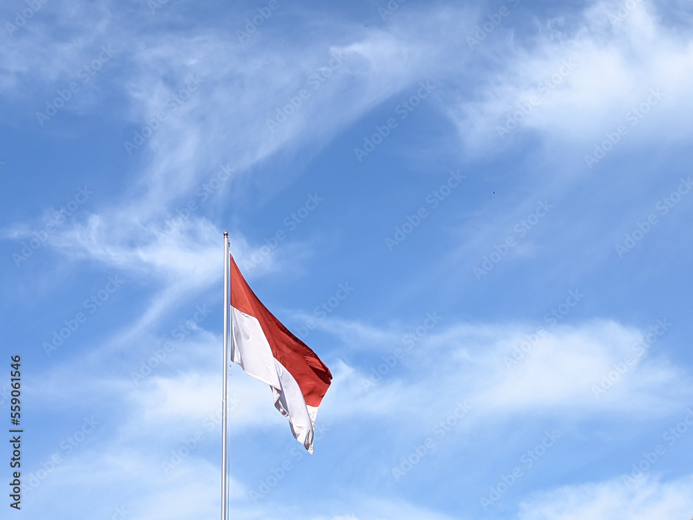 The Merah Putih Flag. View from below. Indonesian flag consist of red ...