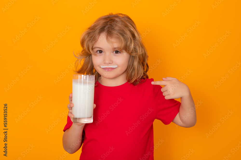 Healthy food for kids. Kid boy with a glass of milk on studio ...