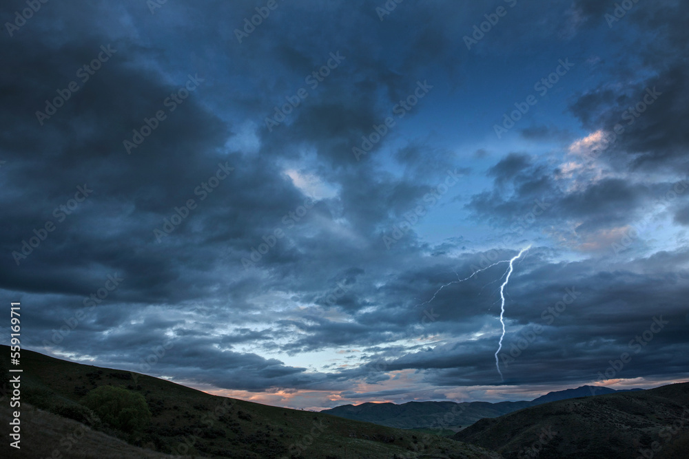 Twilight and rain and thunder clouds near Tarras South Island New ...