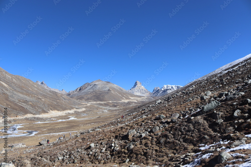 The view of mountain, ice, blue sky, water, cloudy, cool weather are ...