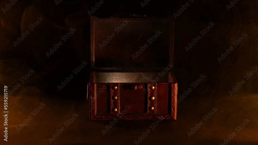 Mysterious chest and key on a dark background. Panoramic mockup for ...