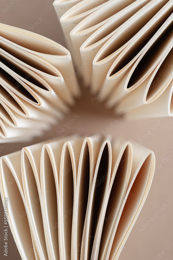 folded paper into what are known as "signatures" in bookbinding - three ...