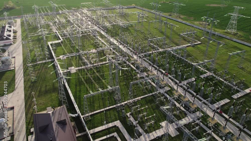 View from flying drone. High-voltage substation with switch, connectors ...