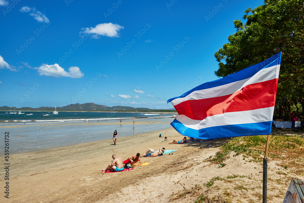 Bandera de Costa Rica en playa Stock Photo | Adobe Stock