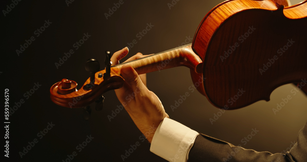 Experienced Violinist performing amazing solo on stage, spotted by ...