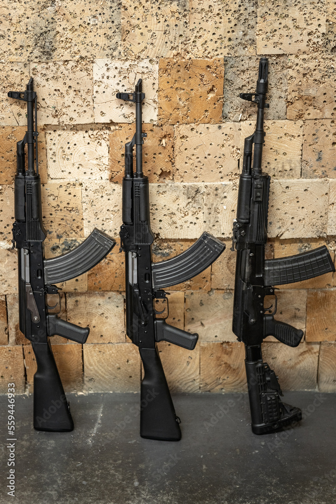 Firearms in shooting range, assault rifles ak 47. Stock Photo | Adobe Stock