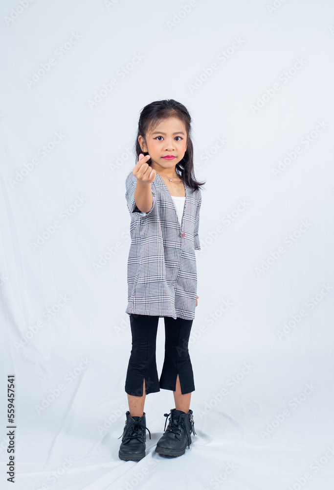 Kid model girl posing in studio background. 5 years old asian kid hand ...