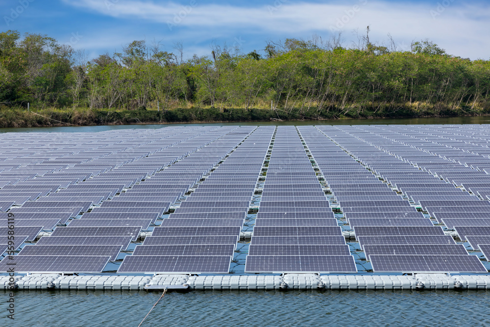 Solar power panels for green energy. Floating solar panels or solar cell Platform system on the ...