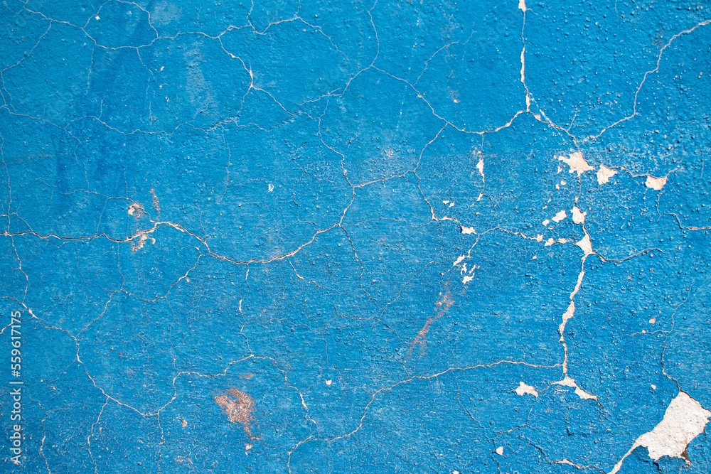Pared desgastada y vieja color azul con grietas ideal para fondos con ...
