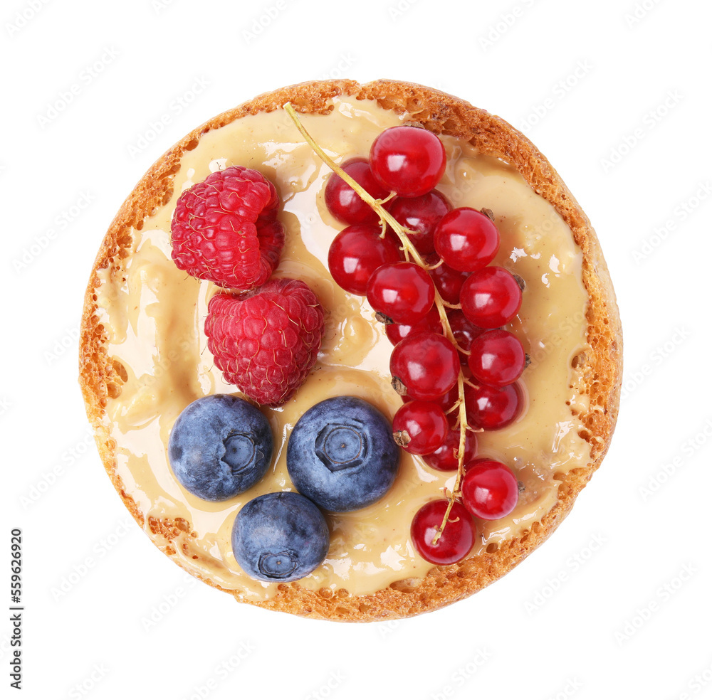 Tasty organic rusk with peanut butter and sweet berries isolated on ...