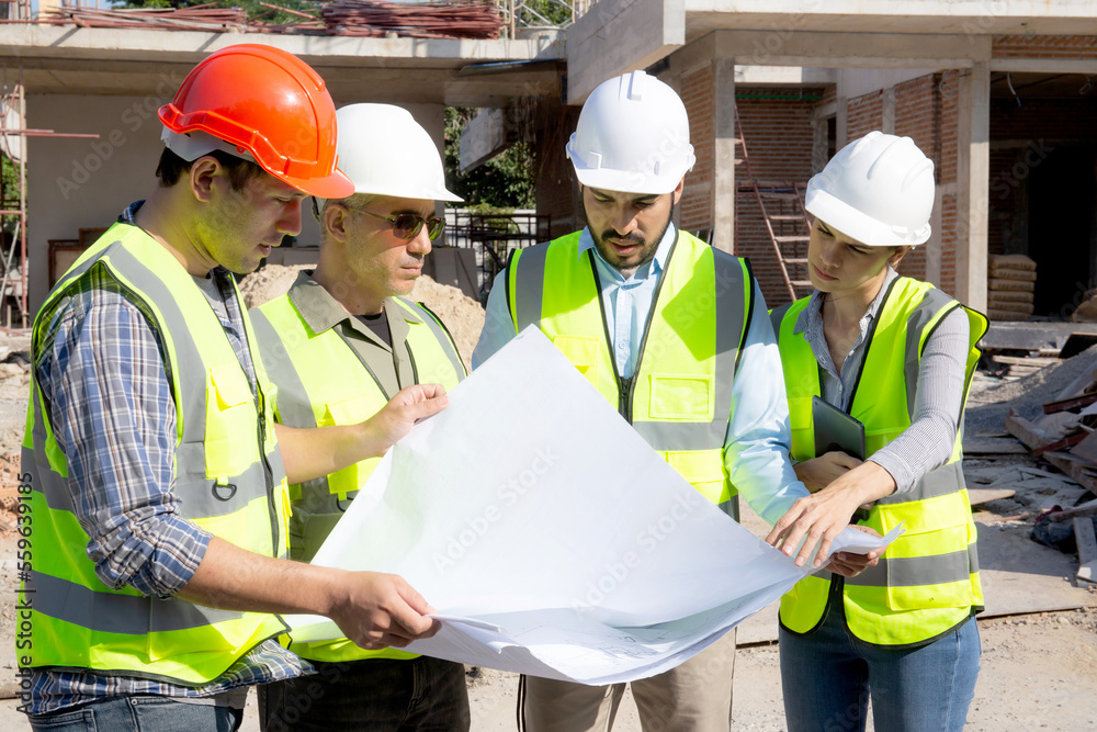 Team group of contractor and architect with foreman explaining about ...