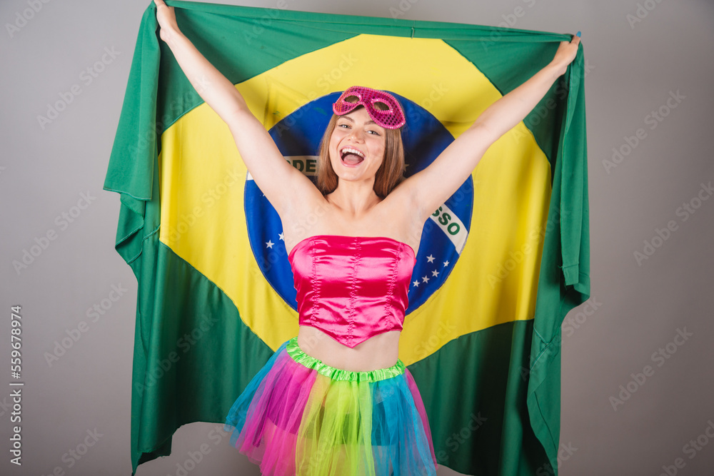 Brazilian blonde woman dressed in pink carnival clothes. wearing ...