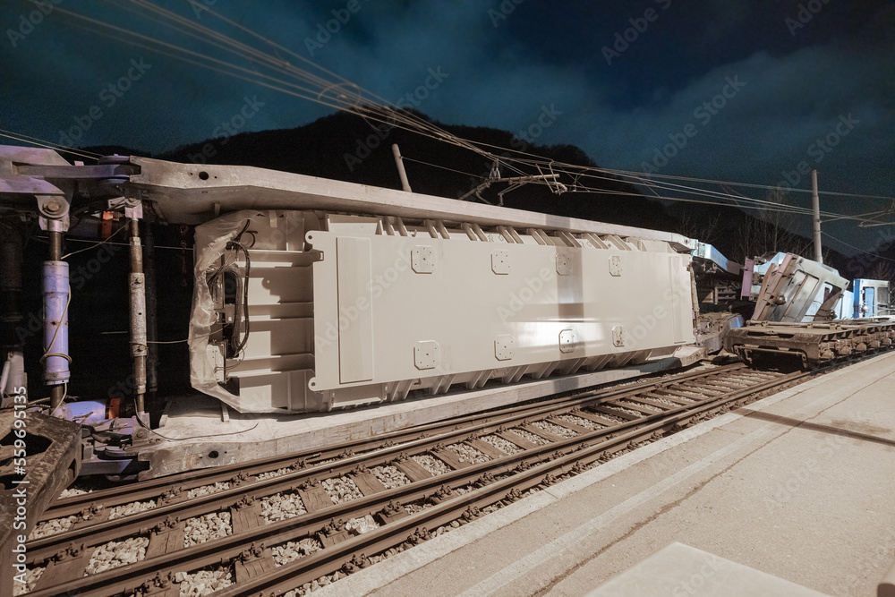 Heavy and wide load of electric transformer on a special train rolled ...