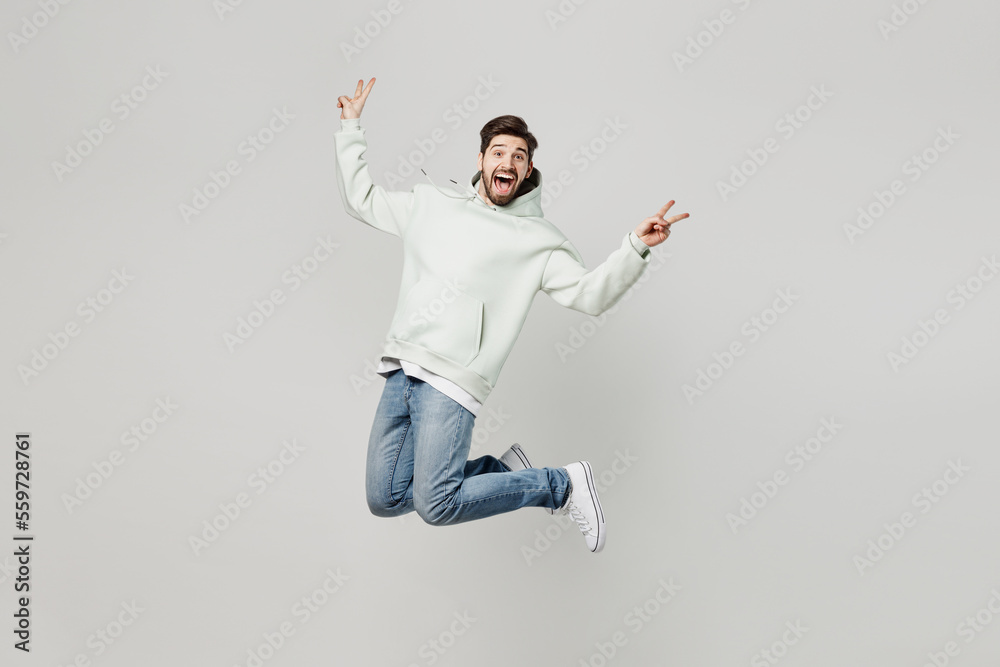 Full body young friendly surprised overjoyed excited satisfied man wear ...