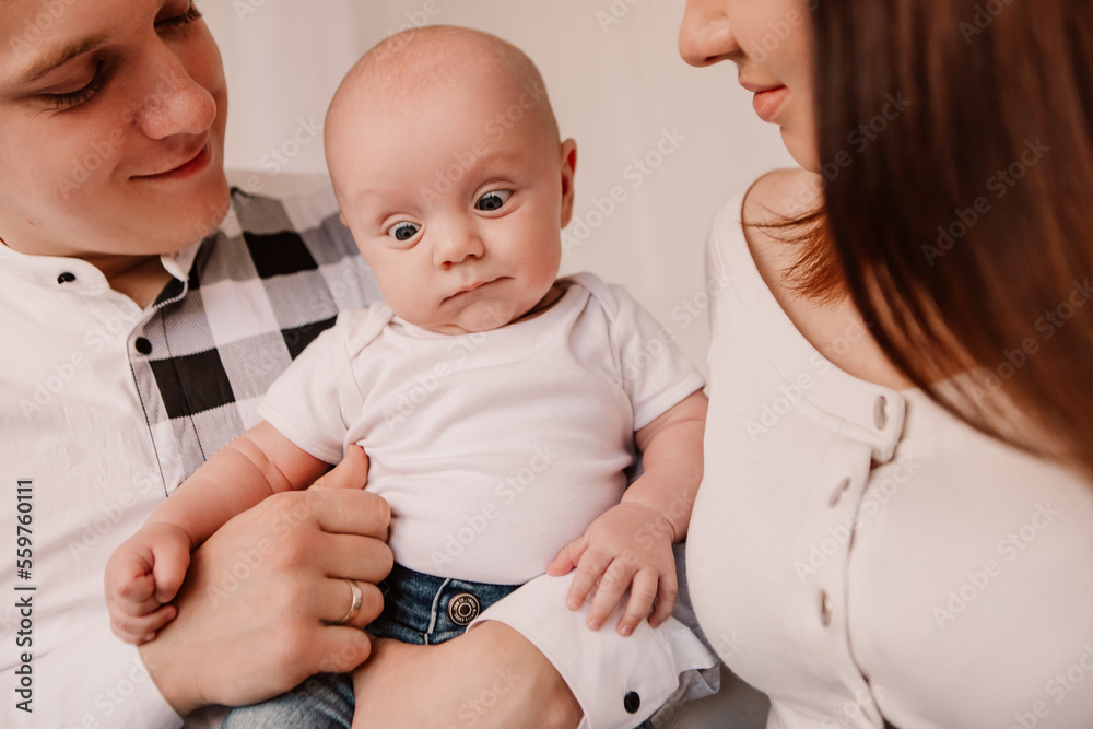 Little boy pop-eyed surprised cute child baby playing with parents ...