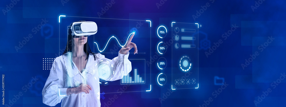 Woman, employee wearing VR glasses and working on virtual holographic ...