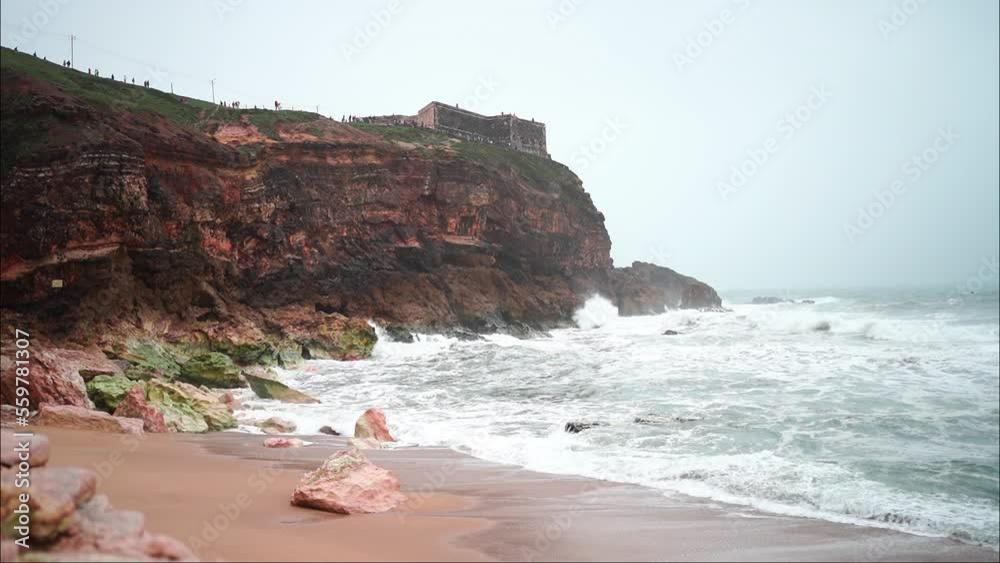 Huge waves at Nazare in Portugal where surfers are being towed in to ...