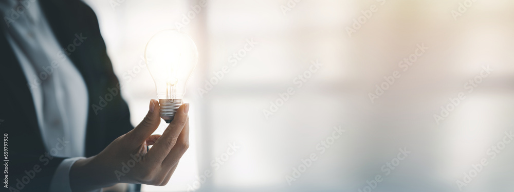 Person holding glowing lamp, Creative new idea. Innovation ...