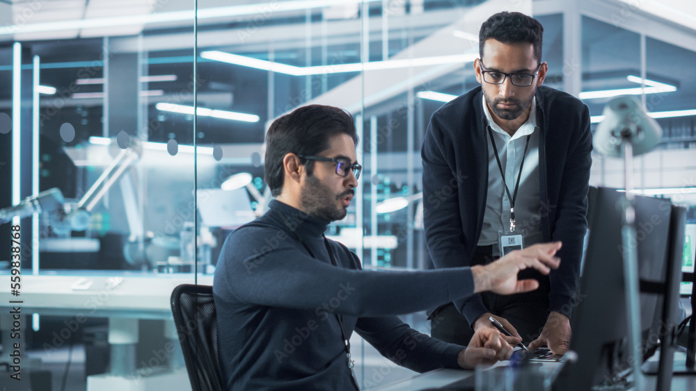 Portrait of Two Young Multiethnic Software Interface Programmers ...