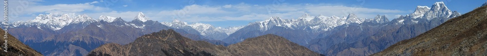 grass and sky Panorama of Himalayan mountain range visible from Kuari ...