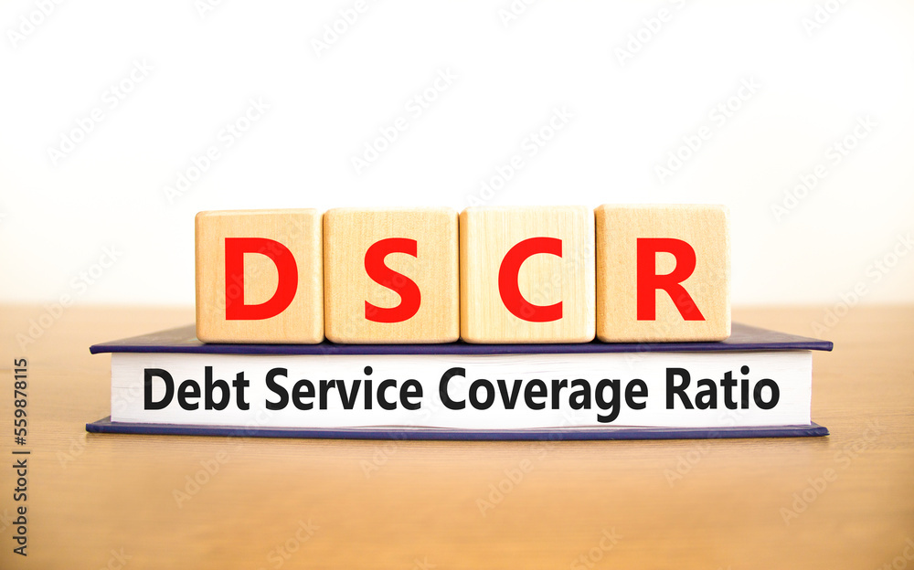 DSCR debt service coverage ratio symbol. Concept words DSCR debt ...