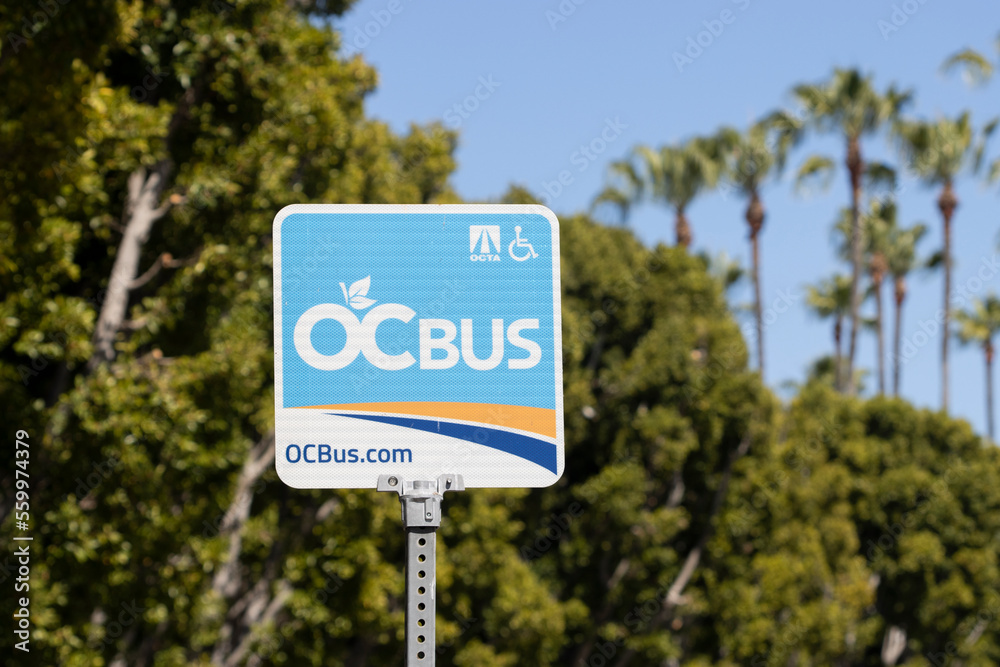 Irvine, CA, USA - May 6, 2022: OC Bus sign is seen on the roadside in ...