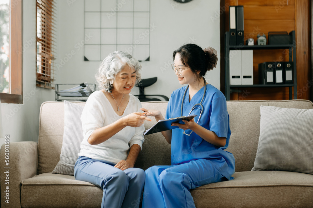 medical doctor holing patient's hands and comforting her.Kind doctor ...