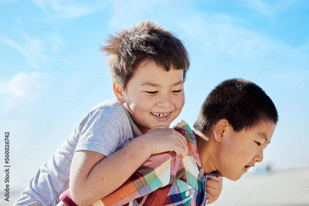 Asian kids, siblings and piggyback on the beach for fun summer vacation ...