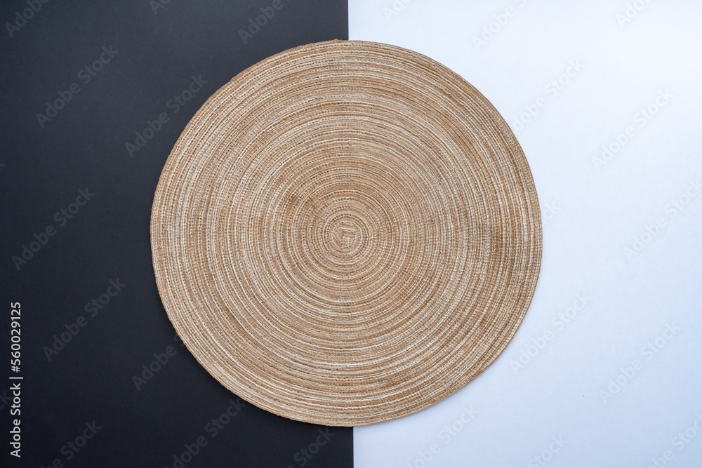 Empty straw table mat on black and white background table. Flat lay ...