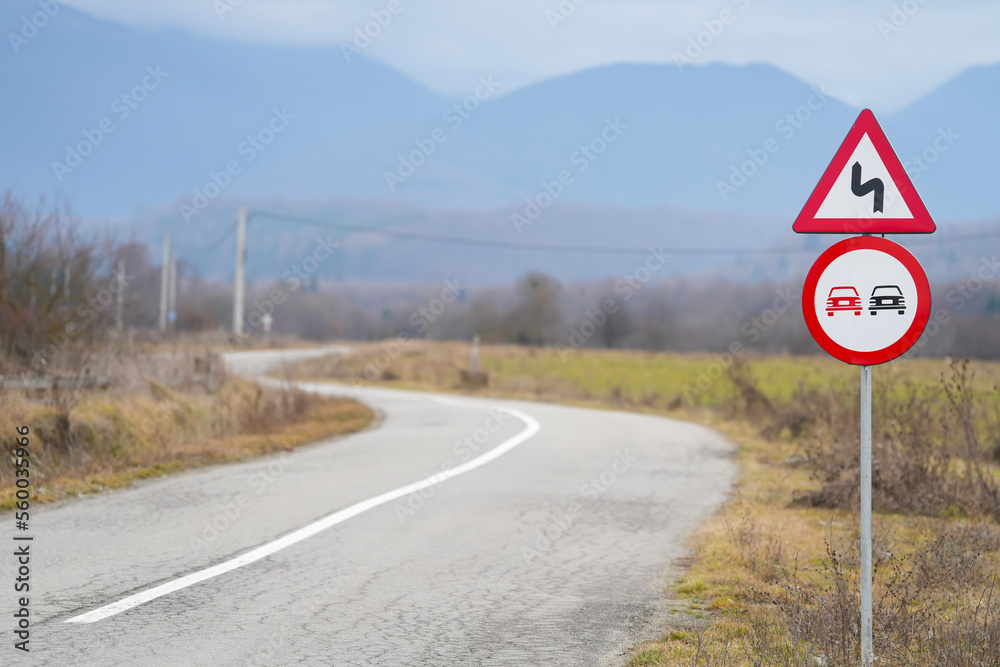 road signs. road signs indicating prohibited overtaking and a sequence ...