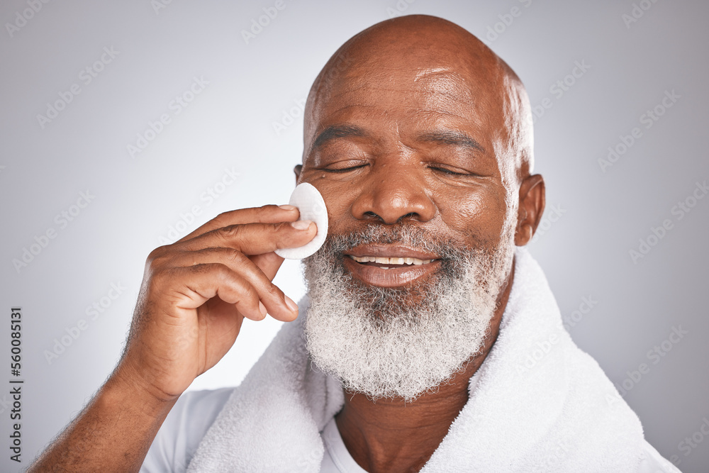 Black man, face and skincare with cotton for self care with dermatology ...