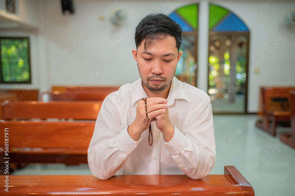 Christian man asking for blessings from God,Asian man praying to Jesus ...
