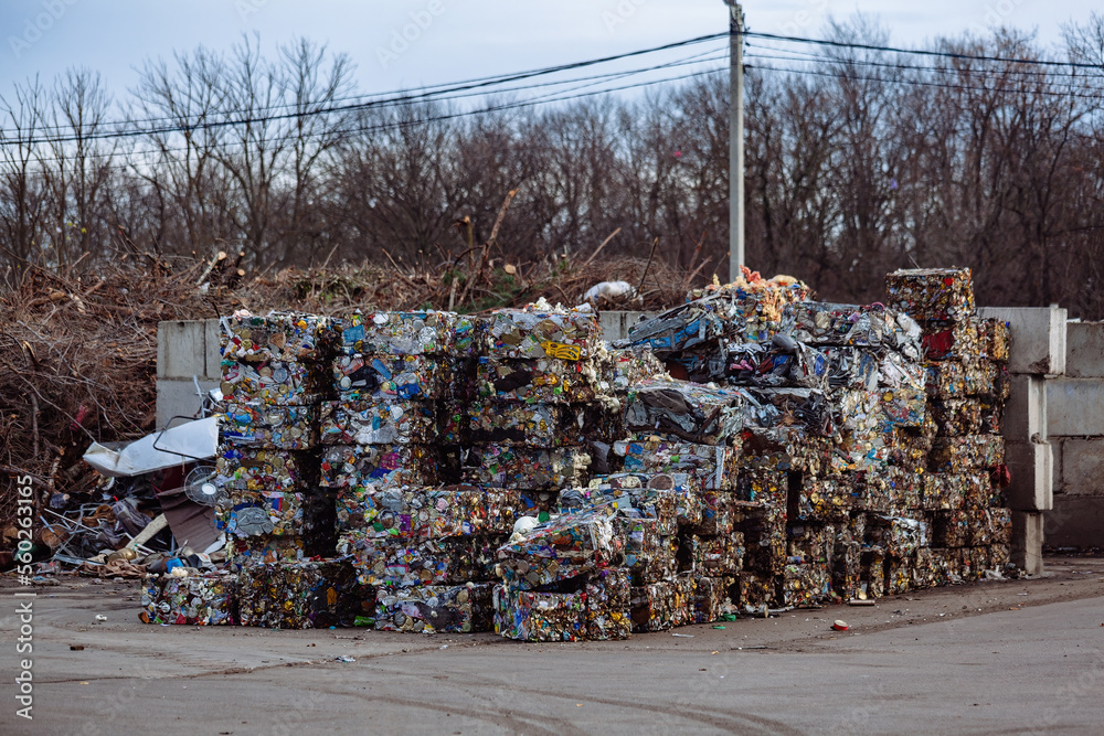 Stacks of garbage. Pressed and packed aluminum and iron cans Stock ...