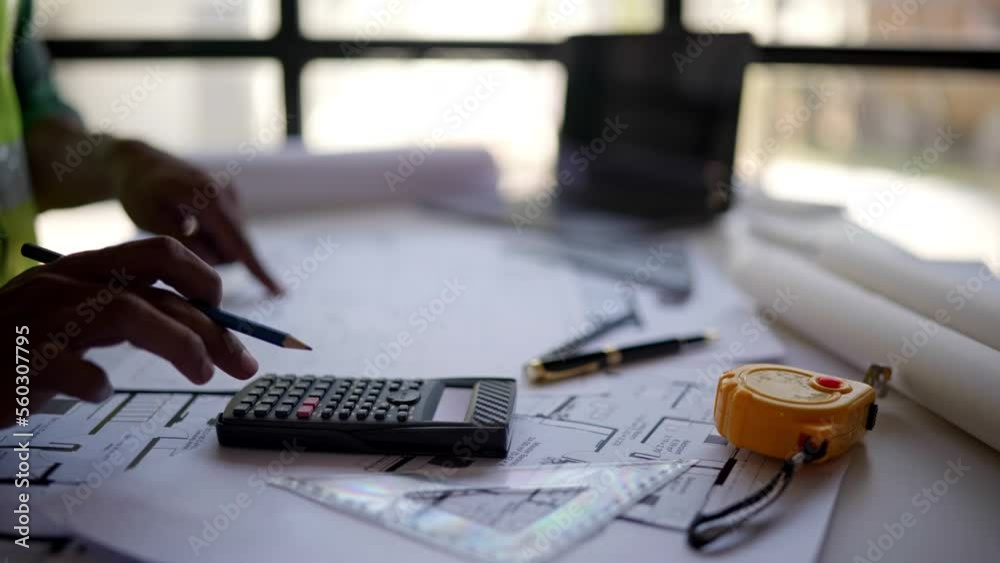 Close up of hands working and calculations estimate for cost and ...