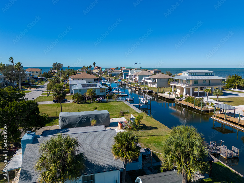 Seaside houses and buildings in a gulf of mexico canal in Florida from ...