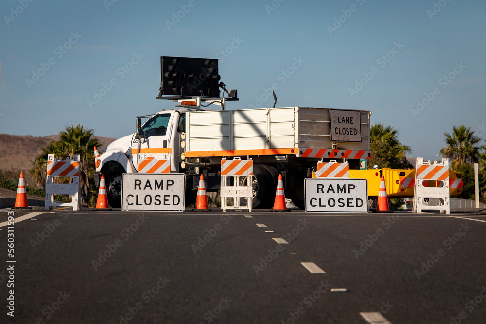 Traffic caused by a sign and cones indicating a freeway onramp is ...