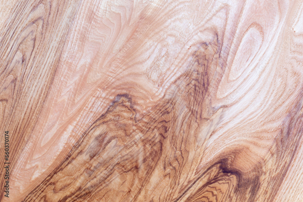 Beautiful wooden background made of cross-cut wood with a pattern of ...