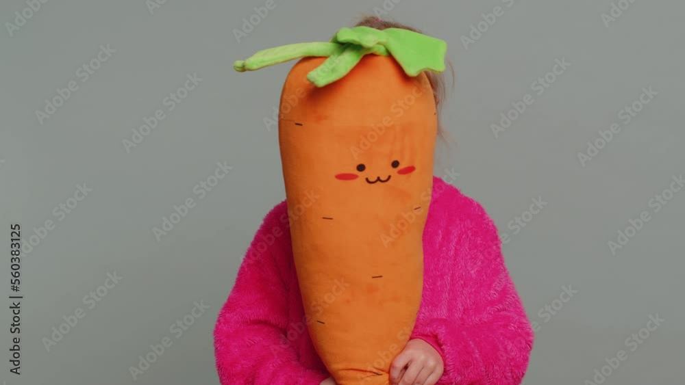 Nosy curious young preteen child girl kid playing hide and seek, peek a ...